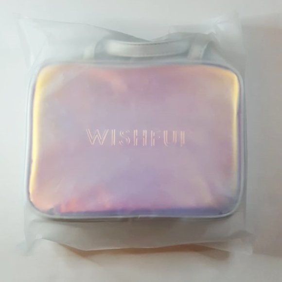 HUDA BEAUTY | Bags | Huda Beauty Wishful Large Clear Holographic Zip ...